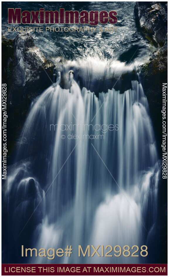 Photo of Beautiful abstract closeup of water falling over the edge of ...