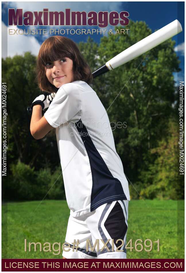 Photo of Boy with a bat practicing baseball | Stock Image MXI24691