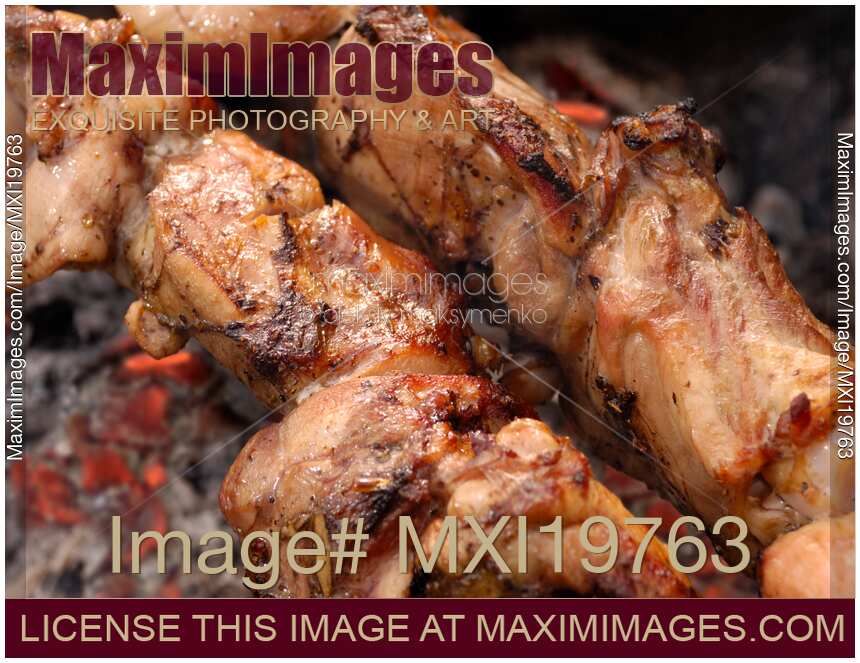 Photo of Chicken barbecue on fire | Stock Image MXI19763