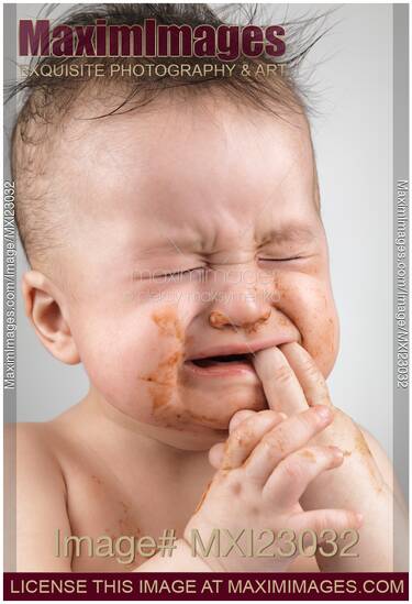 Photo of Crying Baby Boy with Messy Face | Stock Image MXI23032