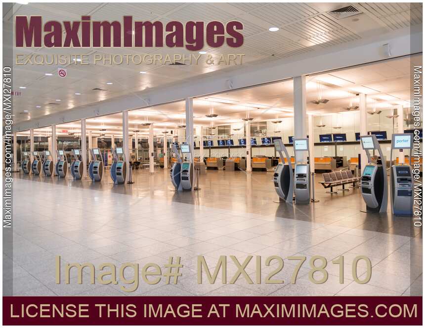 Photo of Electronic check-in kiosks at an airport | Stock Image MXI27810