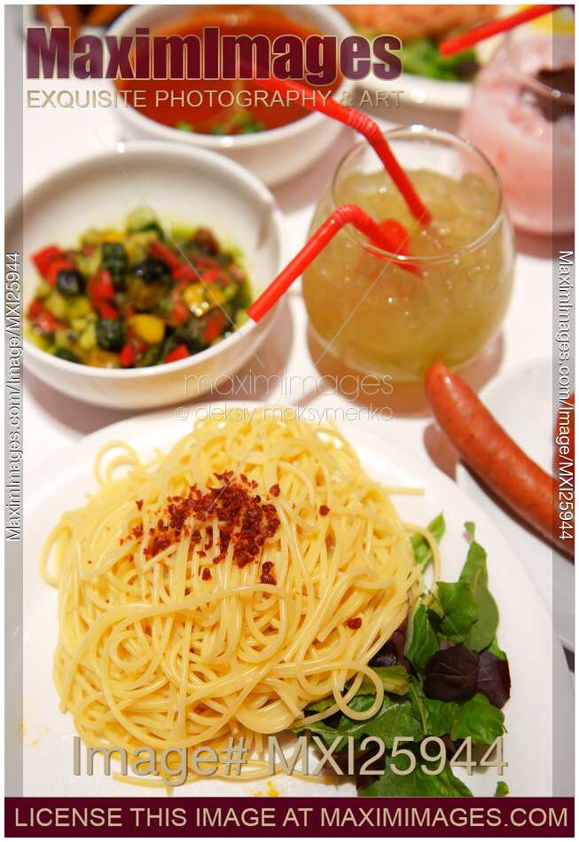 Photo of Pasta lunch on cafe table | Stock Image MXI25944