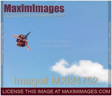 Photo of People Enjoying Free-Fall Swing | Stock Image MXI24752