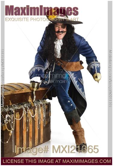 Photo of Pirate with a Sword Opening a Treasure Chest | Stock Image ...