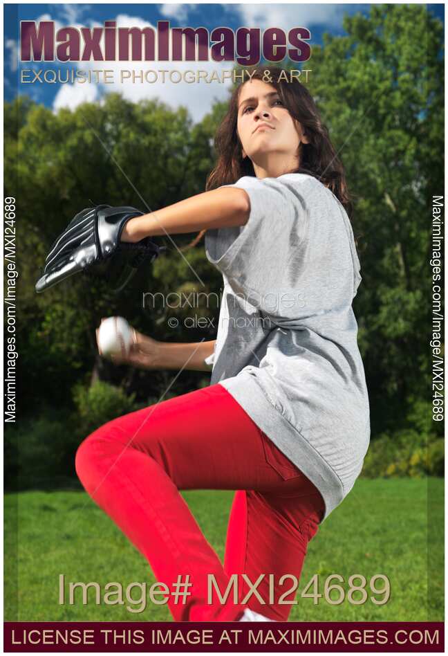 Photo of Teenage girl throwing baseball | Stock Image MXI24689
