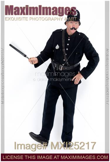 Photo of Vintage police officer with a baton | Stock Image MXI25217
