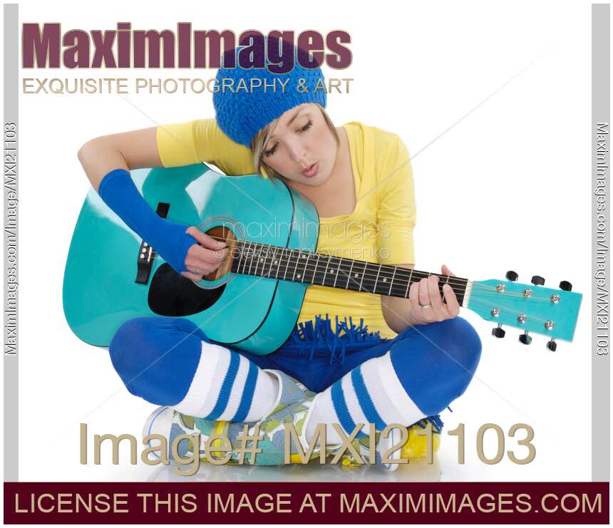 Photo of Woman Playing The Guitar | Stock Image MXI21103
