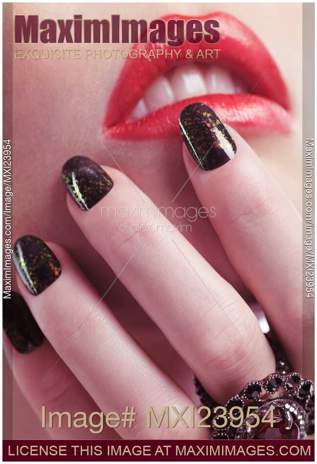 Photo of Woman Touching Lips with Her Hand | Stock Image MXI23954