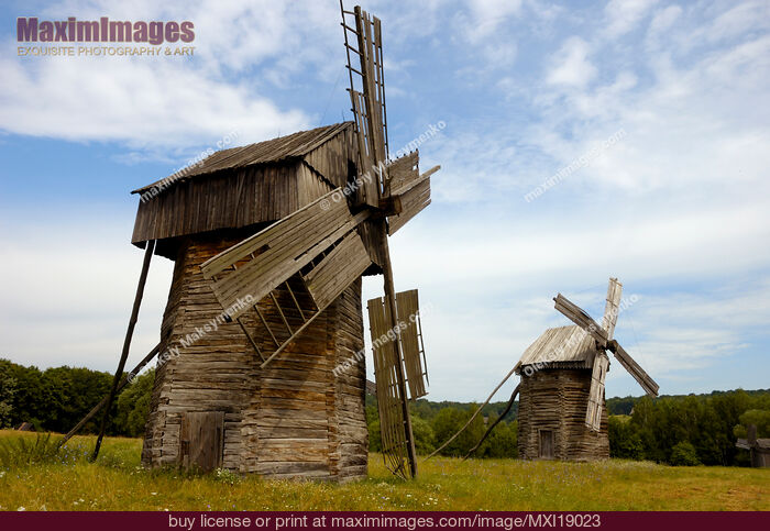 Two Windmills in a Field. Stock Photo MXI19023