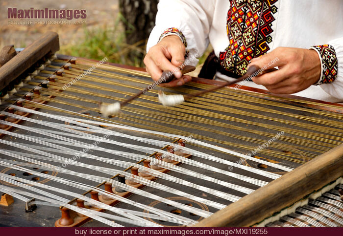 Ukrainian Musician Playing Dulcimer. Stock Photo MXI19255