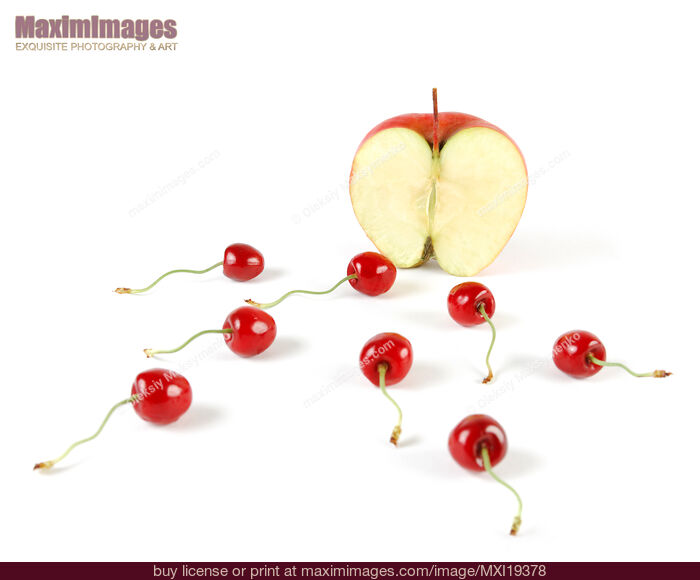 Apple and Cherries insemination concept. Stock Photo MXI19378