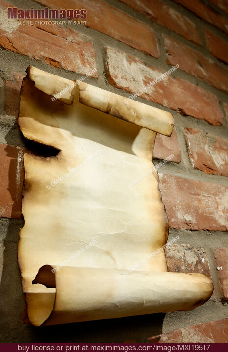 Old Parchment on a Brick Wall. Stock Photo MXI19517