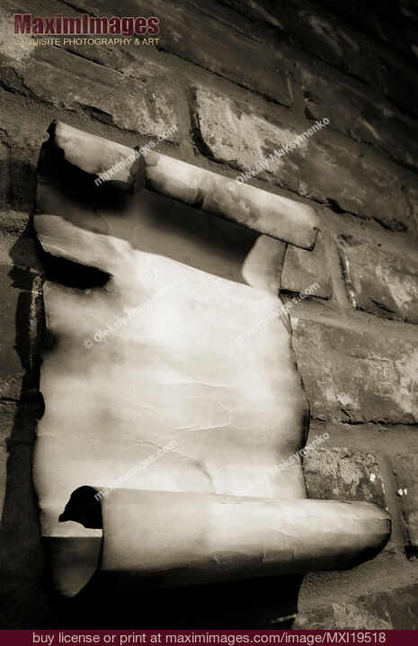 Old Parchment on a Brick Wall. Stock Photo MXI19518