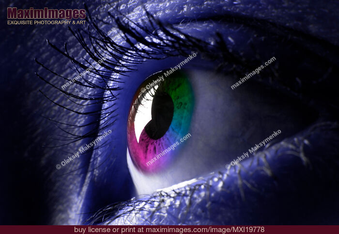 Rainbow colored eye closeup. Stock Photo MXI19778