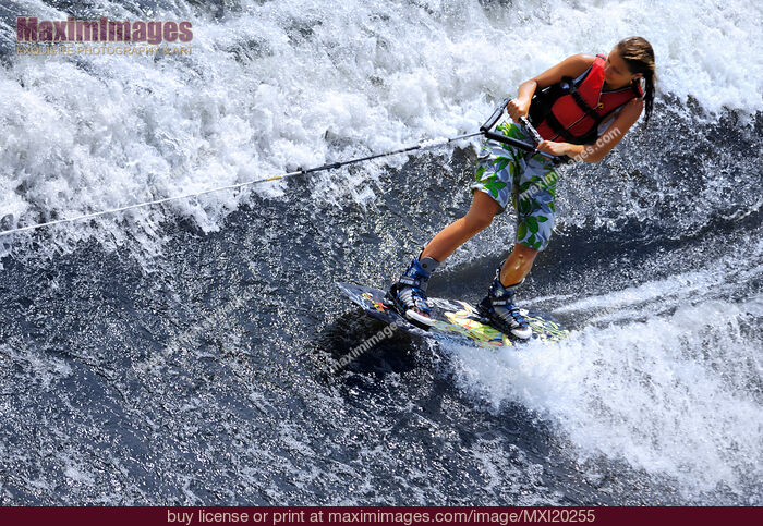 Teenage Girl Wakeboarding. Stock Photo MXI20255