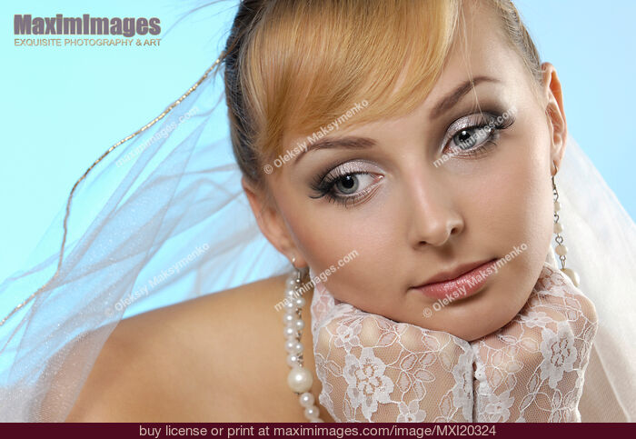 Young bride with thoughtful face. Stock Photo MXI20324