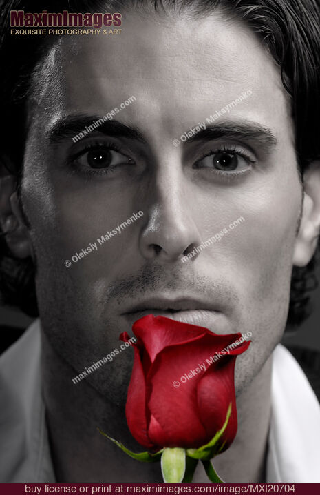 Man with a Red Rose. Stock Photo MXI20704