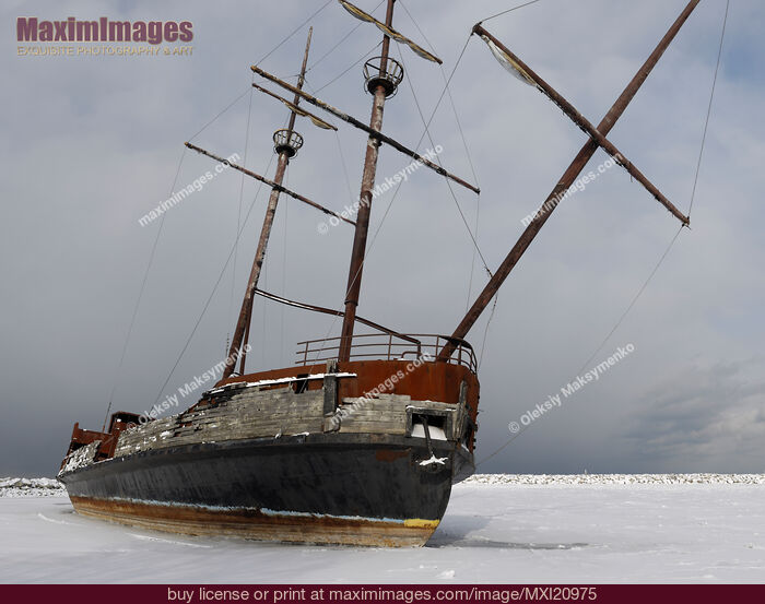 Grounded Ship in Frozen Water. Stock Photo MXI20975