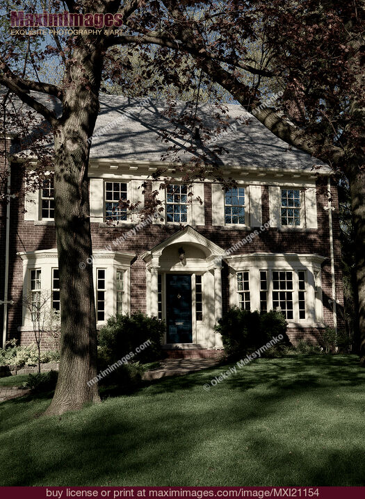 Large House Behind Trees. Stock Photo MXI21154