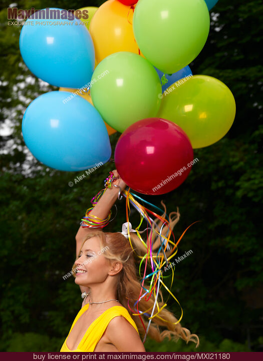 Girl with Air Balloons. Stock Photo MXI21180