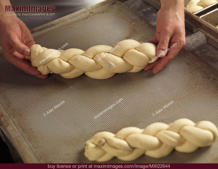 Baker Making Braided Bread. Stock Photo MXI22644