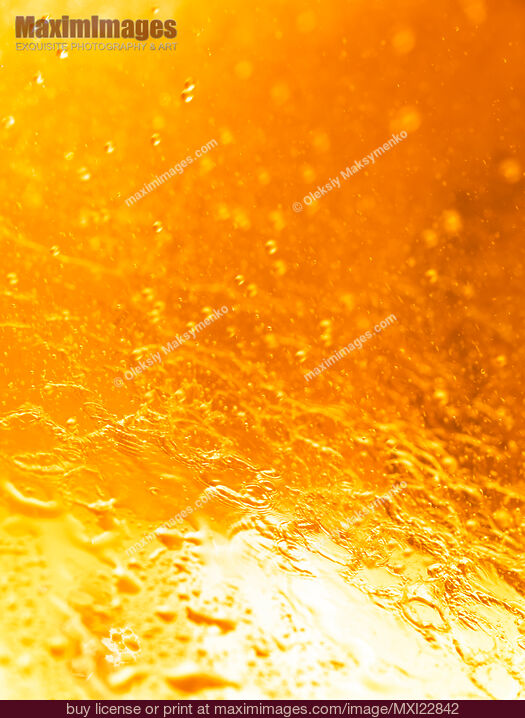 Orange splashing water abstract background. Stock Photo MXI22842