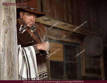 Cowboy Standing on a Porch portrait in Wild west style. Stock Photo ...