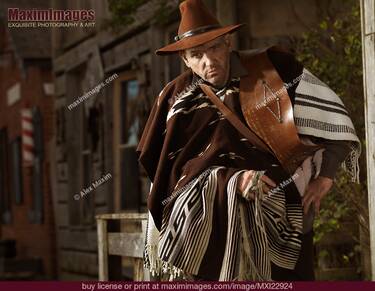 Portrait of a Cowboy Notorious villain in Wild west style. Stock Photo ...