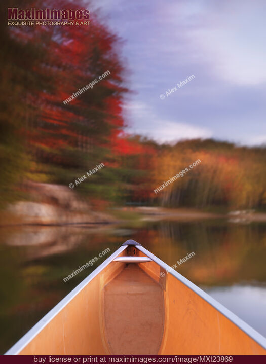 Canoe on a Lake in Autumn. Stock Photo MXI23869