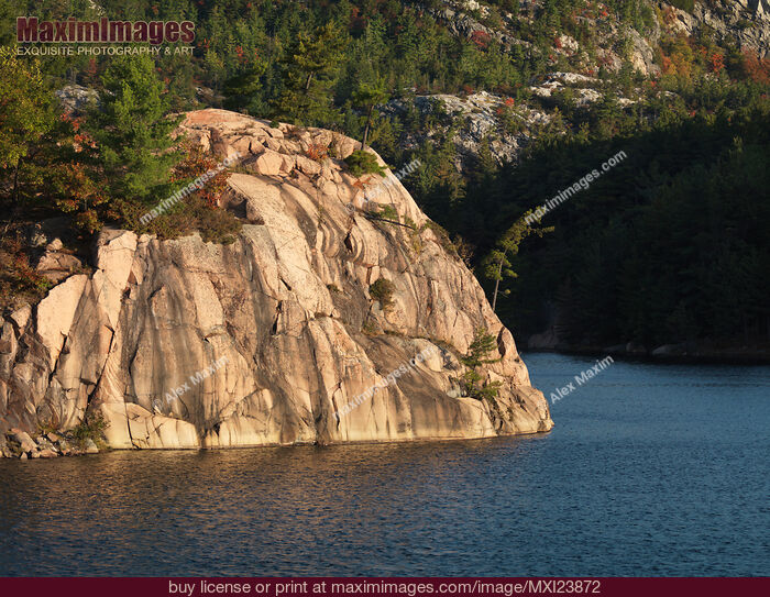 Autumn Nature Lake Rocks and Trees. Stock Photo MXI23872