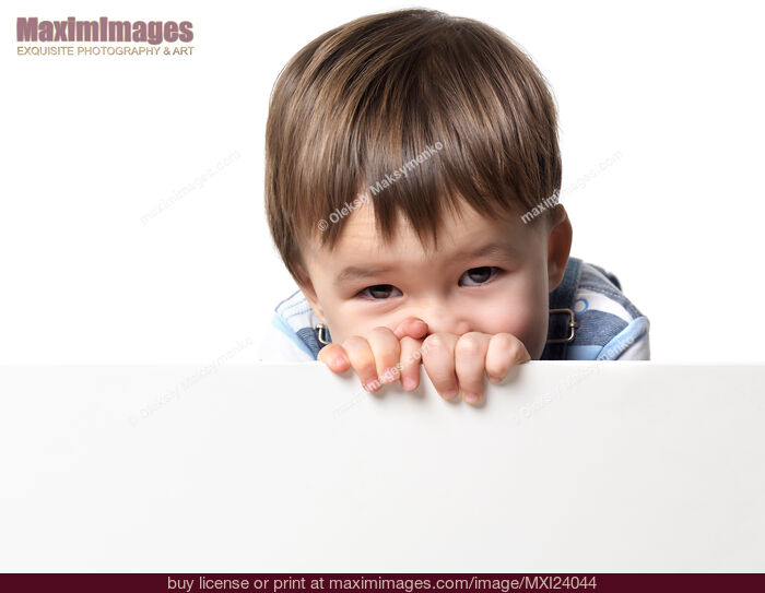 Little boy holding a white sign. Stock Photo MXI24044