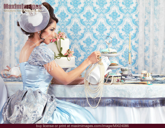 Lady at a tea party. Stock Photo MXI24086