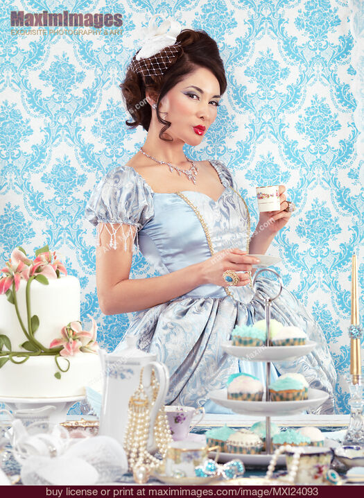 Beautiful asian lady drinking tea. Stock Photo MXI24093