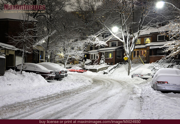 Snow covered street at night. Stock Photo MXI24930