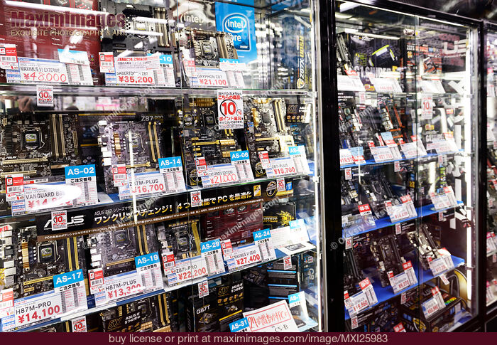 Computer motherboards on display in store. Stock Photo MXI25983
