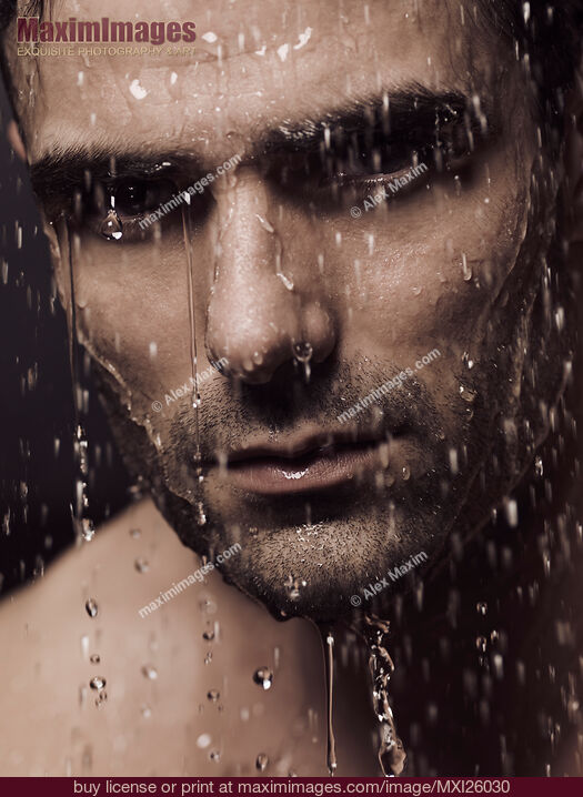 Dramatic portrait of man face with water pouring over it. Stock Photo ...