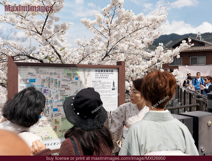 People reading sightseeing map in Kyoto Japan. Stock Photo MXI26950