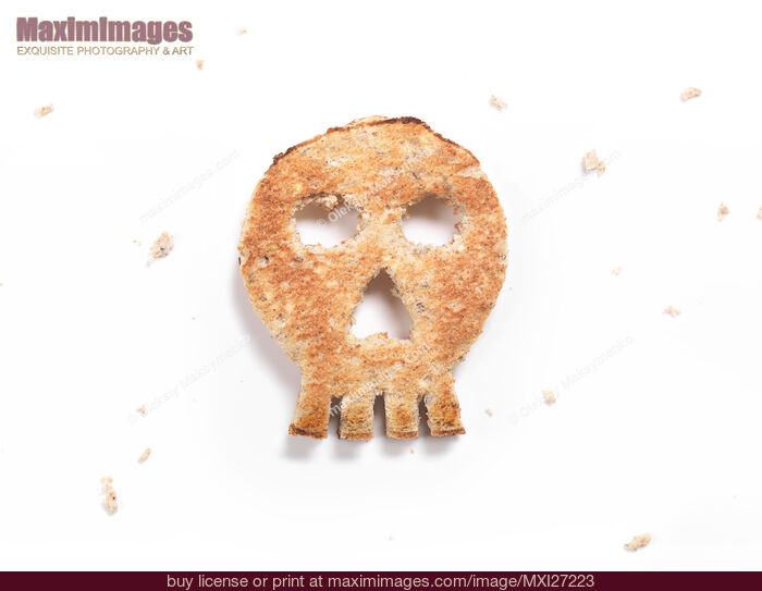 Skull made of toasted bread. Stock Photo MXI27223