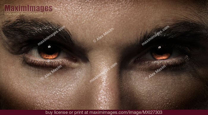 Closeup of man fierce eyes. Stock Photo MXI27303