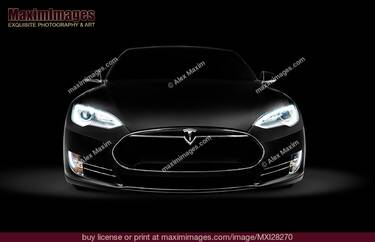Black Tesla Model S luxury electric car front view. Stock Photo MXI28270