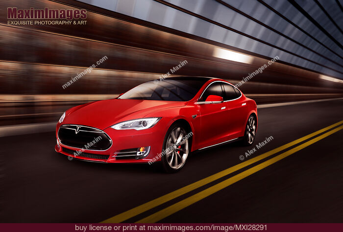 Red Tesla Model S red luxury electric car speeding in a tunnel. Stock ...