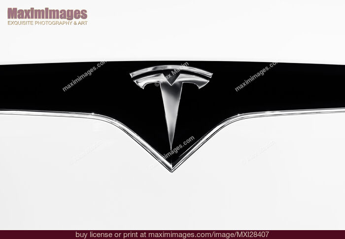 Tesla electric car logo trademark emblem. Stock Photo MXI28407