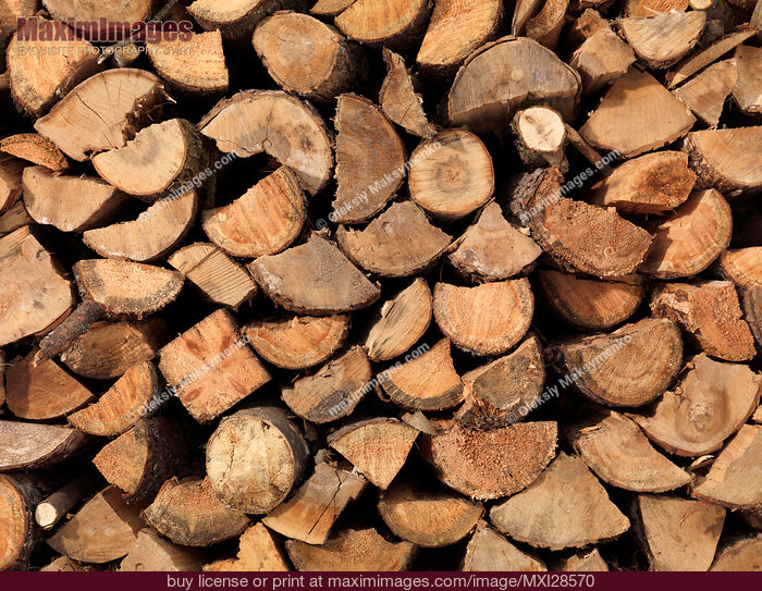 Stacked firewood background. Stock Photo MXI28570