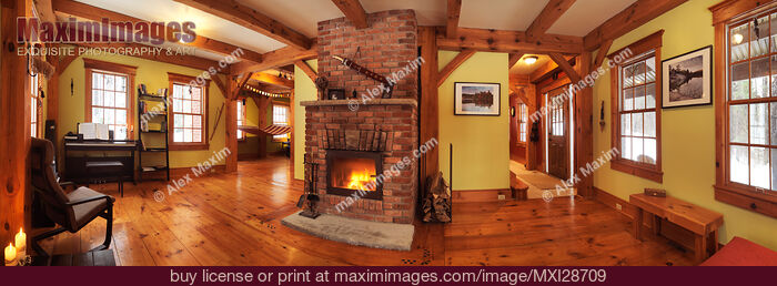 Timber frame Canadian house interior living room with fireplace. Stock ...