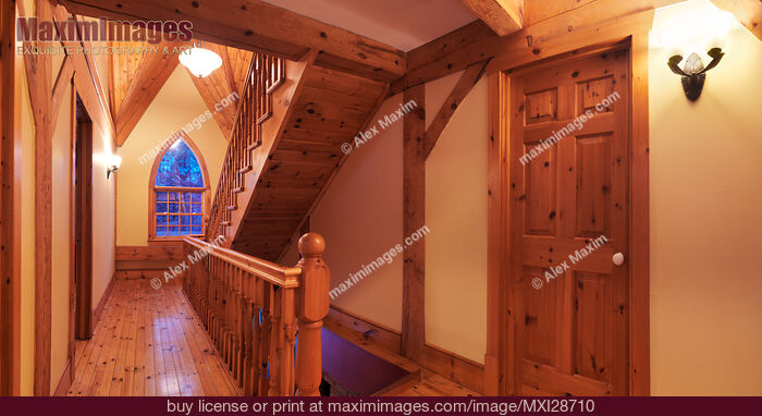 Timber frame cottage style Canadian house hall with wooden staircase ...