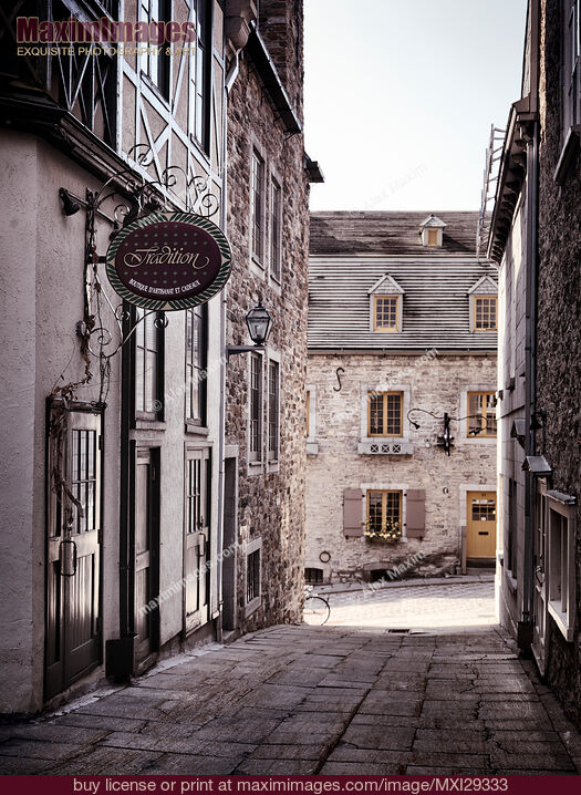 Tradition boutique store sign in a small historic street of Old Quebec ...