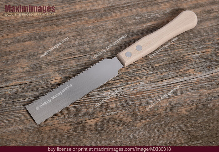 Kugihiki Japanese flush cut double edge hand saw. Stock Photo MXI30318