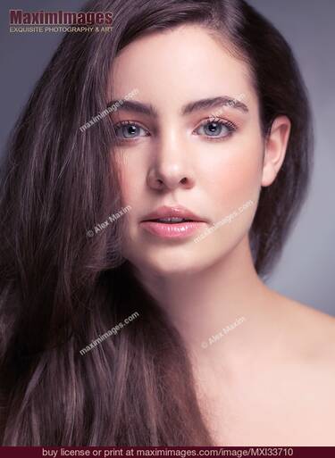 Young caucasian woman beautiful face with large gray eyes, sensual pink ...