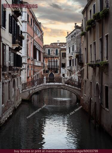 City of Venice sunset scenery of historic old buildings and a small ...