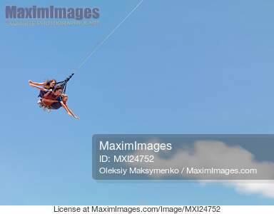 Photo of People Enjoying Free-Fall Swing | Stock Image MXI24752